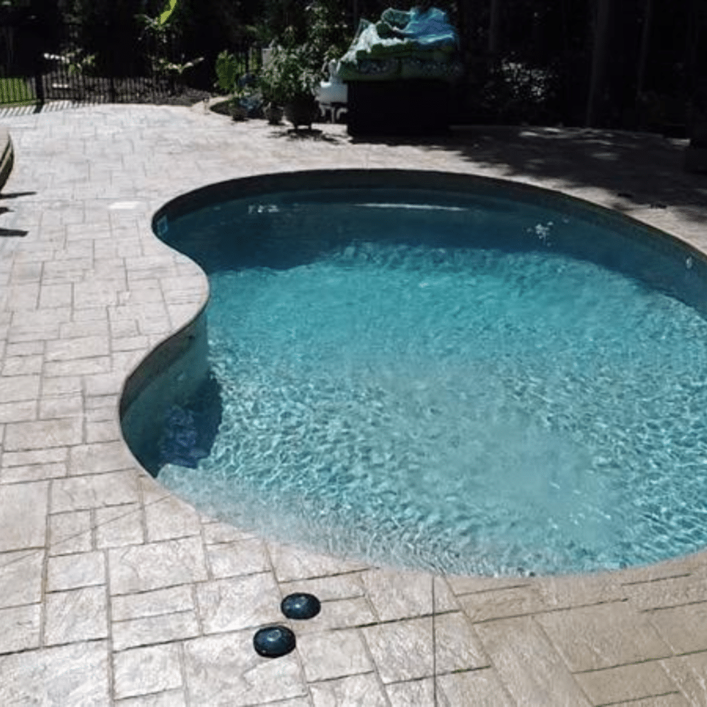 How A Stamped Concrete Pool Deck Maximizes Your Investment - Sam The ...